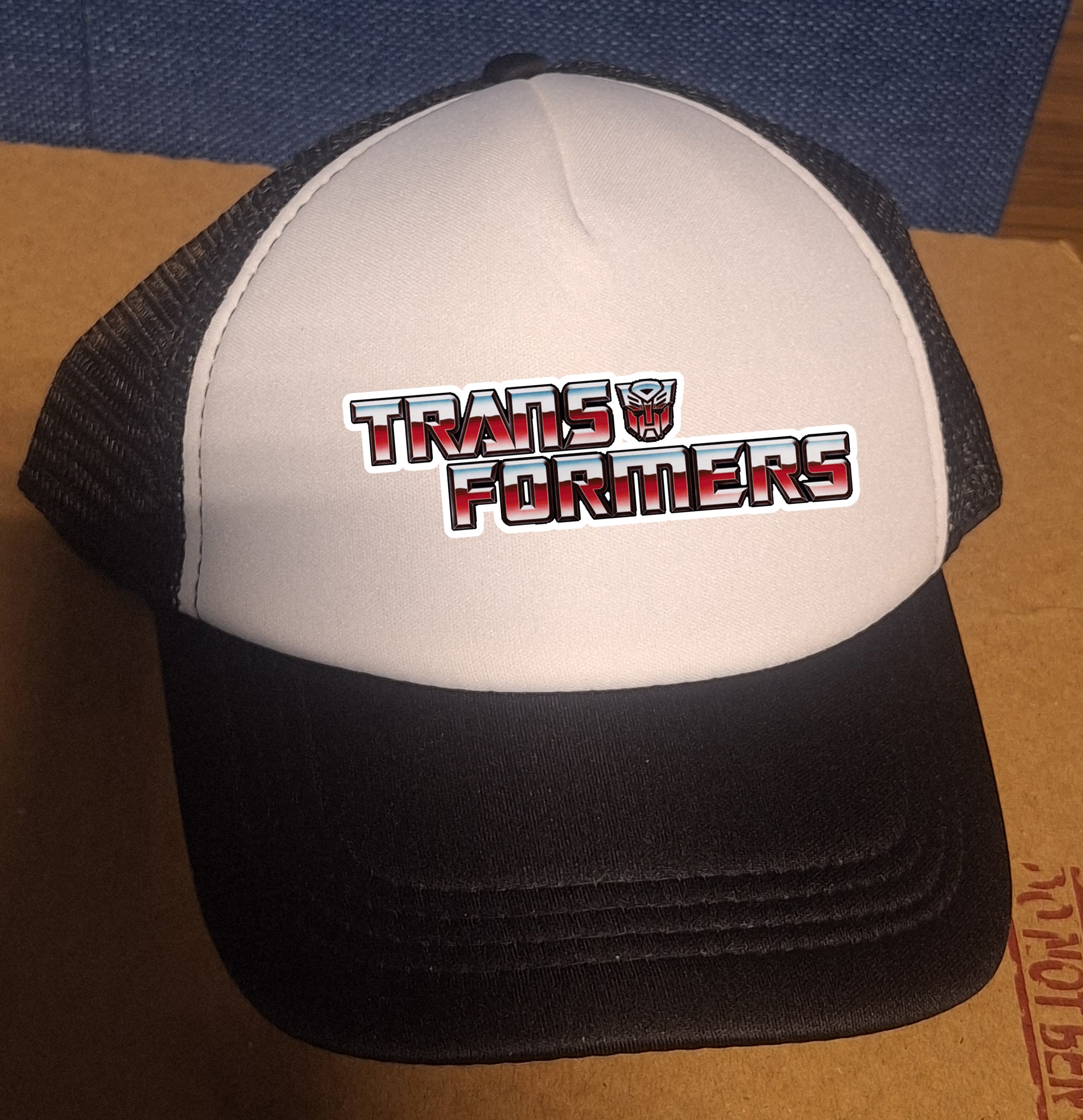 Adjustable Trucker Cap with Retro Transformers Cartoon Logo – Sign Junky